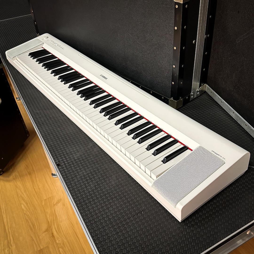 Yamaha Piaggero NP-35 76-Key Portable Keyboard - White BONUS PAK – Kraft Music